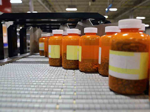 Pusher Conveyor Systems for Efficient Material Handling | Shuttleworth